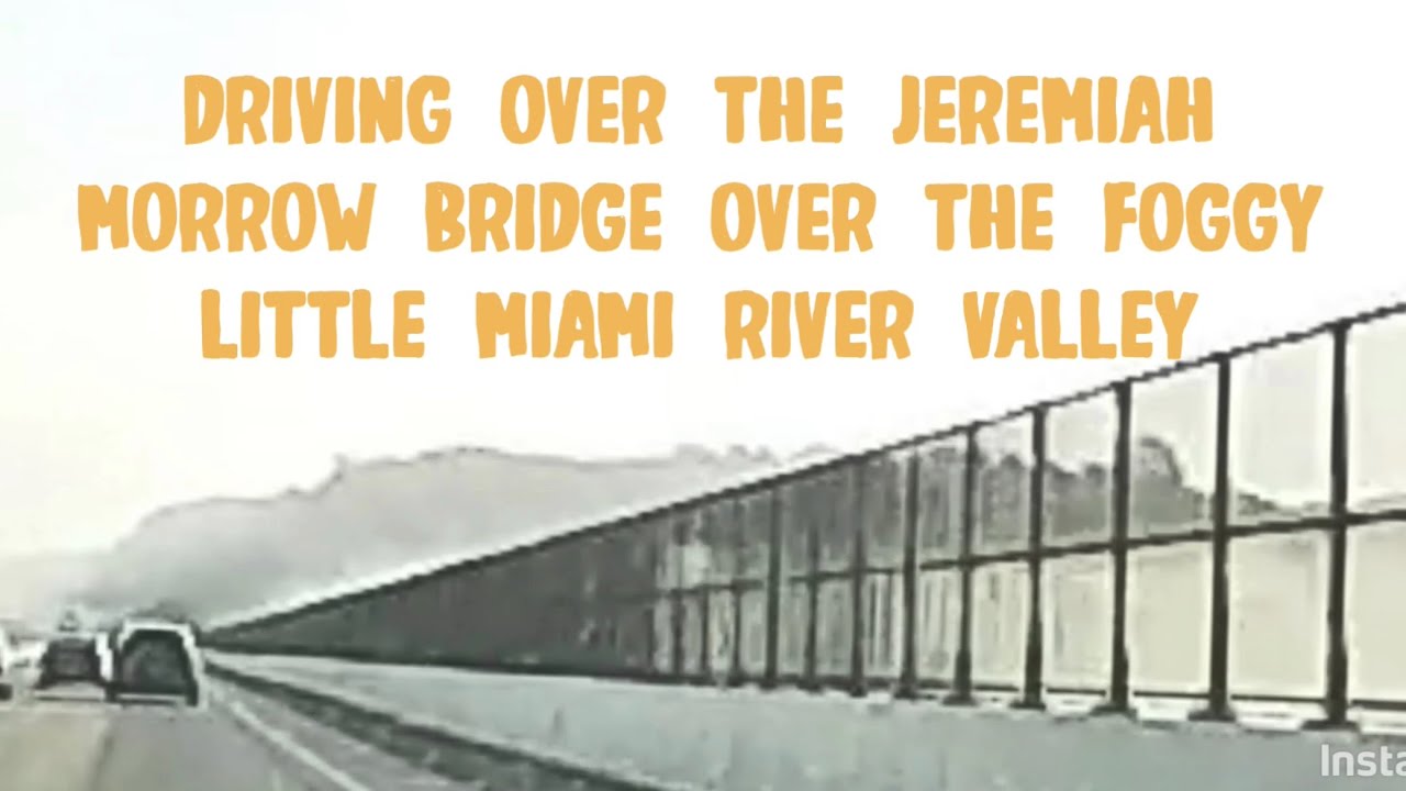 Diving over the Jeremiah Morrow Bridge crossing a fog covered Little ...