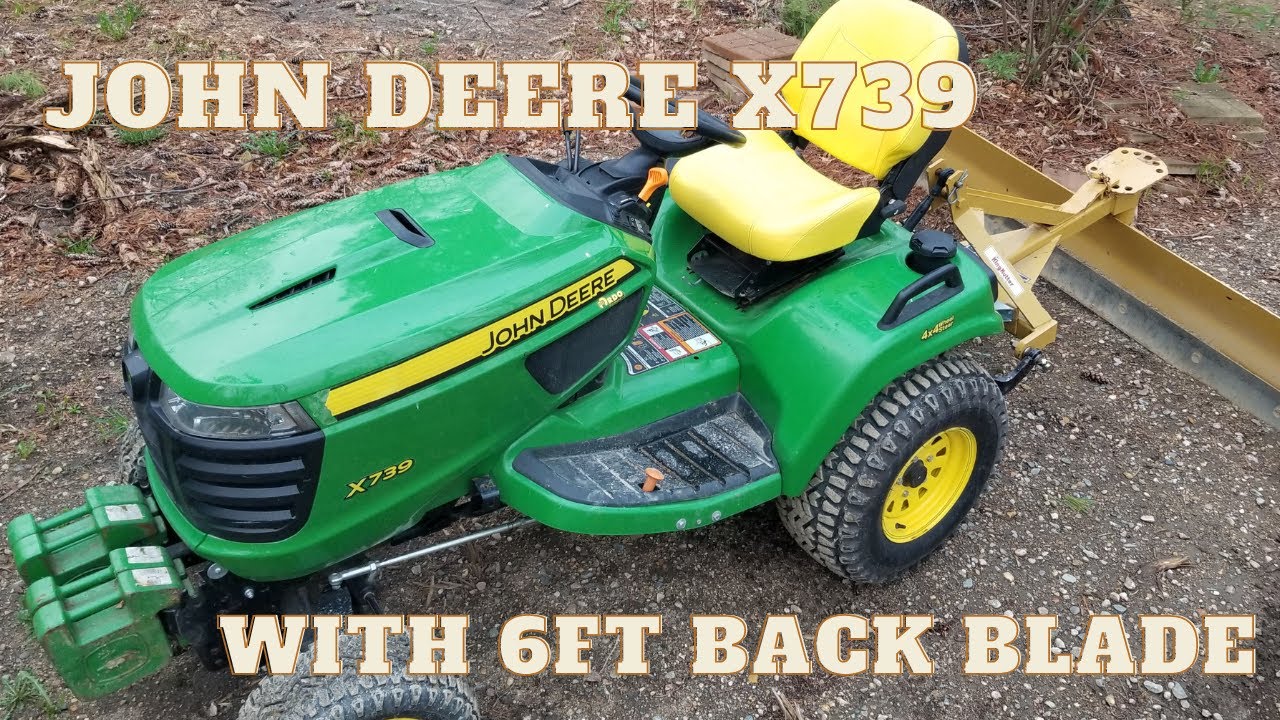 John Deere X739 with 6ft back blade. - YouTube