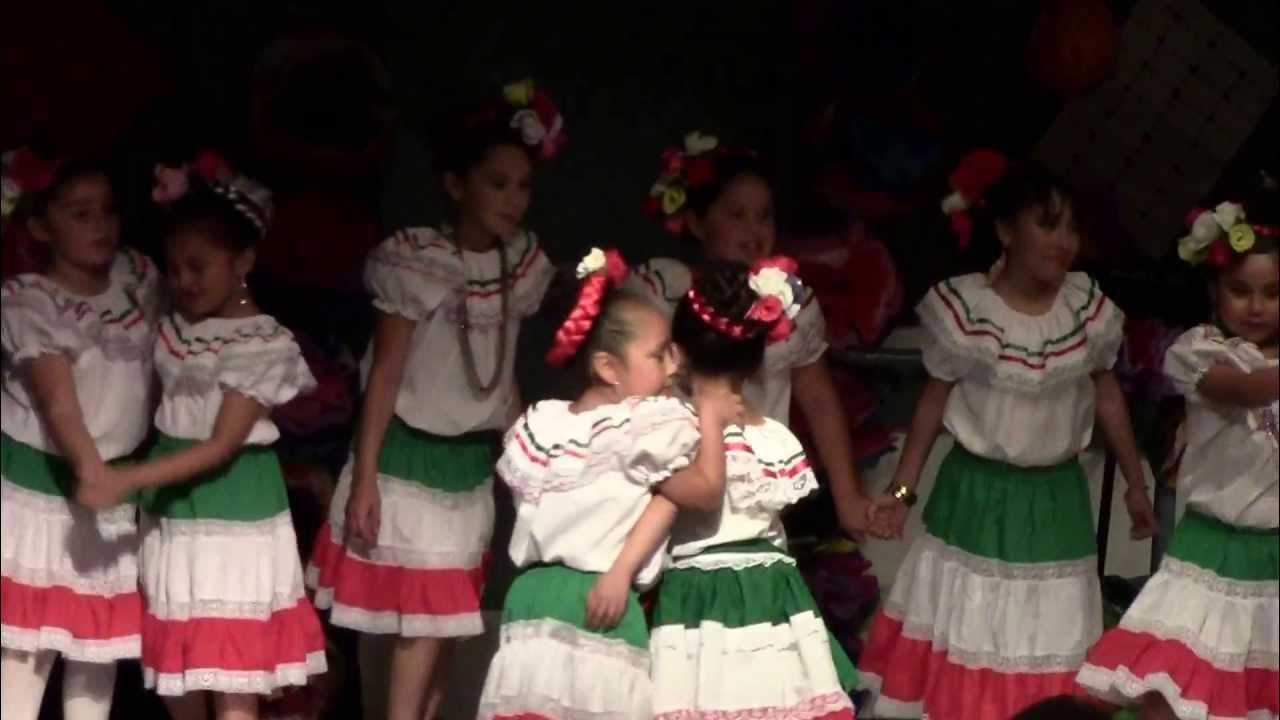 Annabelle performs a Mexican folk dance called La Laspa at her school ...