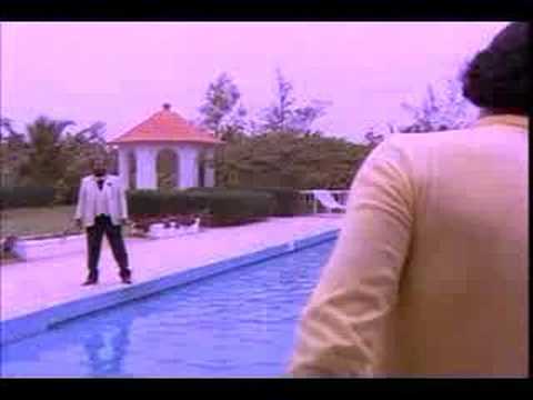 Amala in Bikini from Kodi Parakkuthu