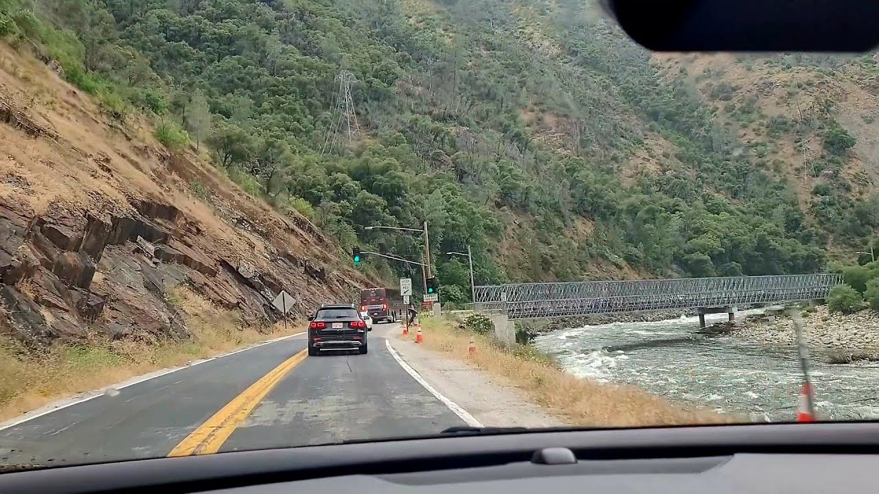 Crossing the bridge along the wild and scenic Merced River on Highway ...