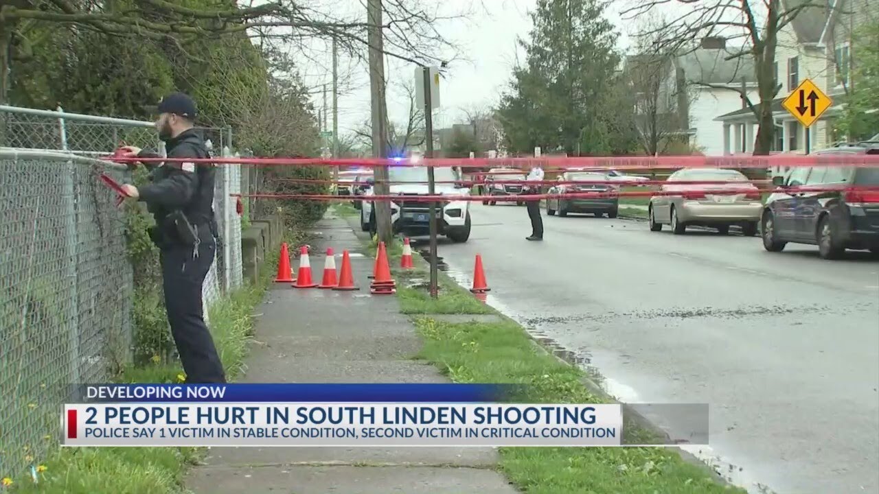 Crime scene tape set up around car with bullet holes at Ohio State's ...