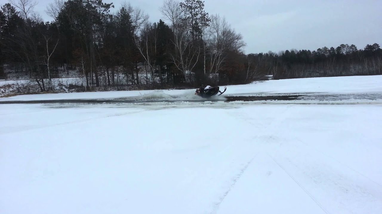 Drunken snowmobile water skipping - YouTube