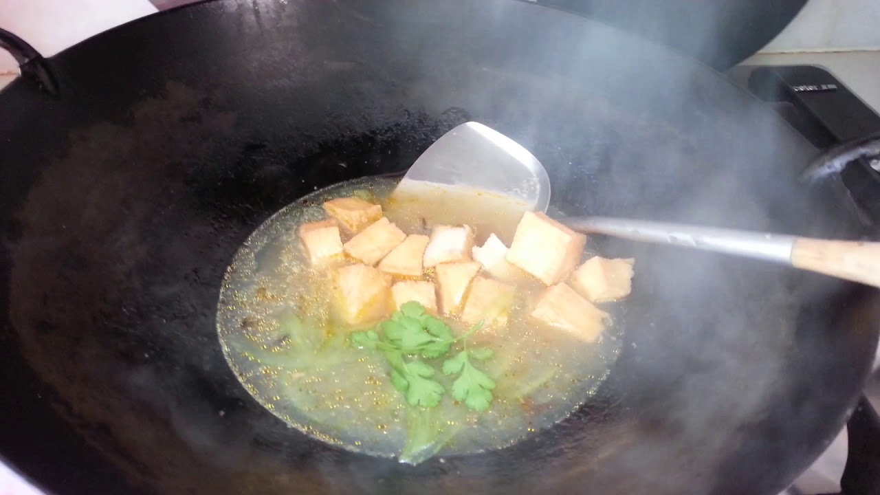 Tofu fish cakes with celery in Crab paste soup - YouTube