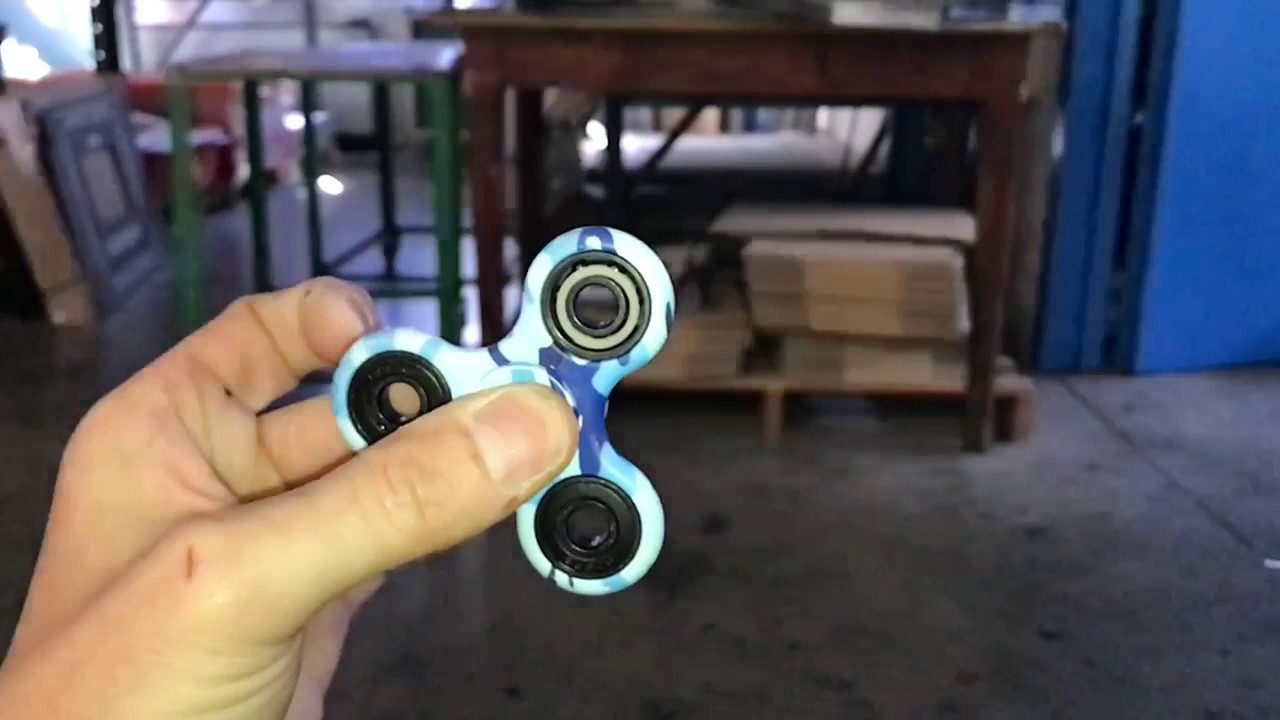 Super hi-speed FIDGET SPINNER slow motion iPhone 7 - YouTube