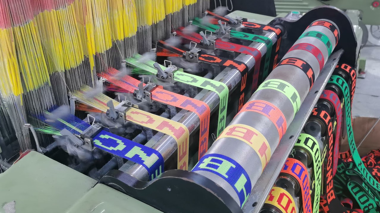 High-speed computerized jacquard needle loom - YouTube