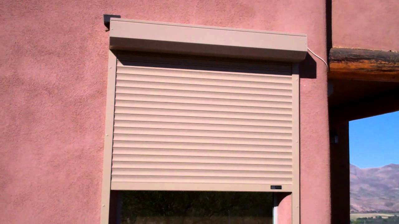 Rolling Security Shutters and Motorized Sun Screen Installation - YouTube