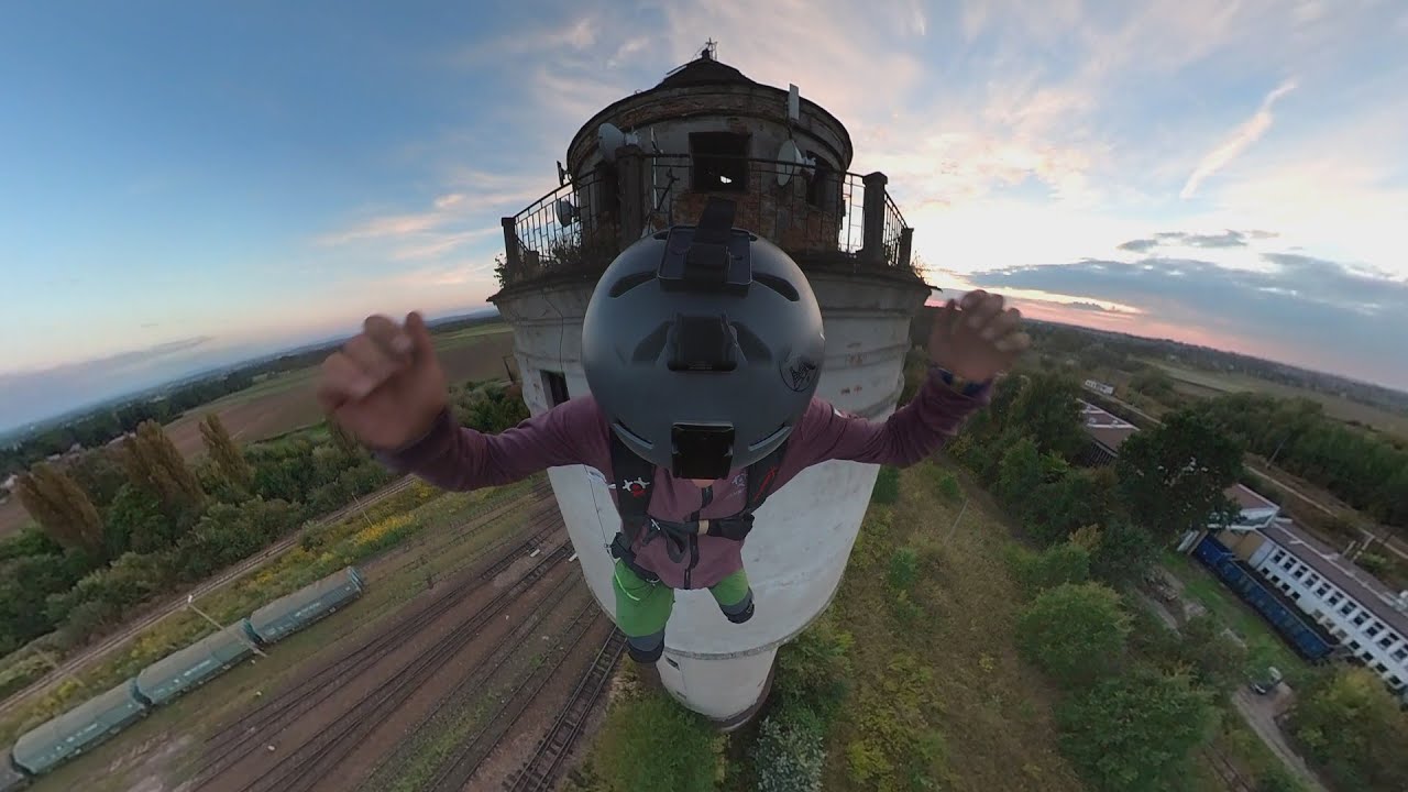 UNCUT - ultra low 27 meters BASE jump from water tower - YouTube