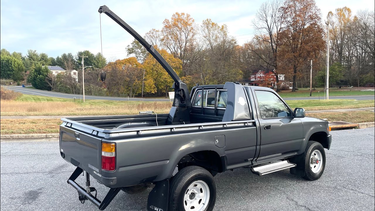 1993 TOYOTA HILUX LN106 with 93,403 miles and a factory OEM crane ...