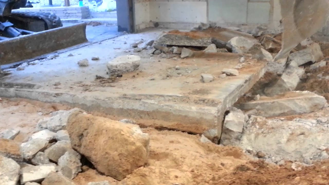 Breaking concrete out of the garage - YouTube