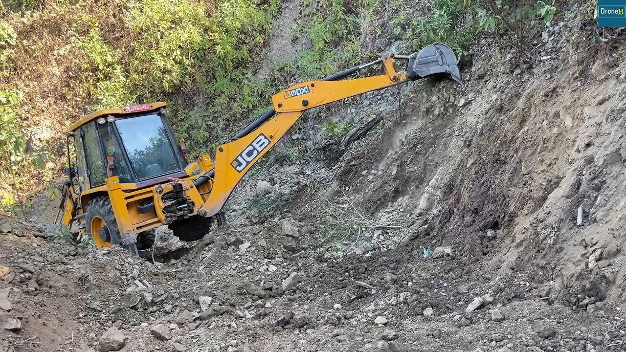 JCB Backhoe Fixing Landslide Damaged Mountain Road - YouTube
