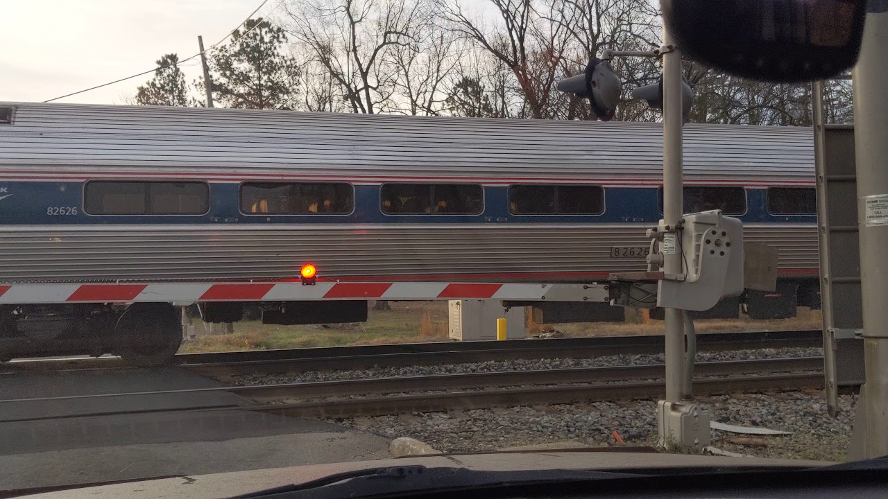 Two Amtrak passenger trains at Hilltop Road crossing - YouTube