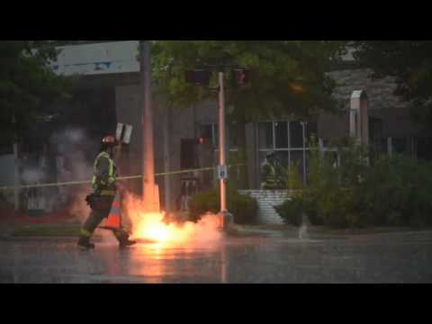 Traffic signal pole caught on fire after struck by lightning - YouTube