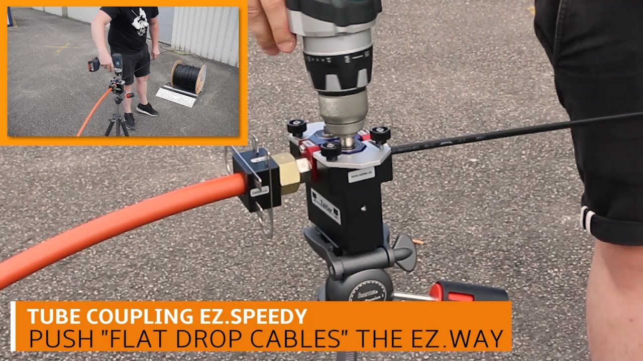 Installation of Flat Drop Cable with pusher and power drill - YouTube