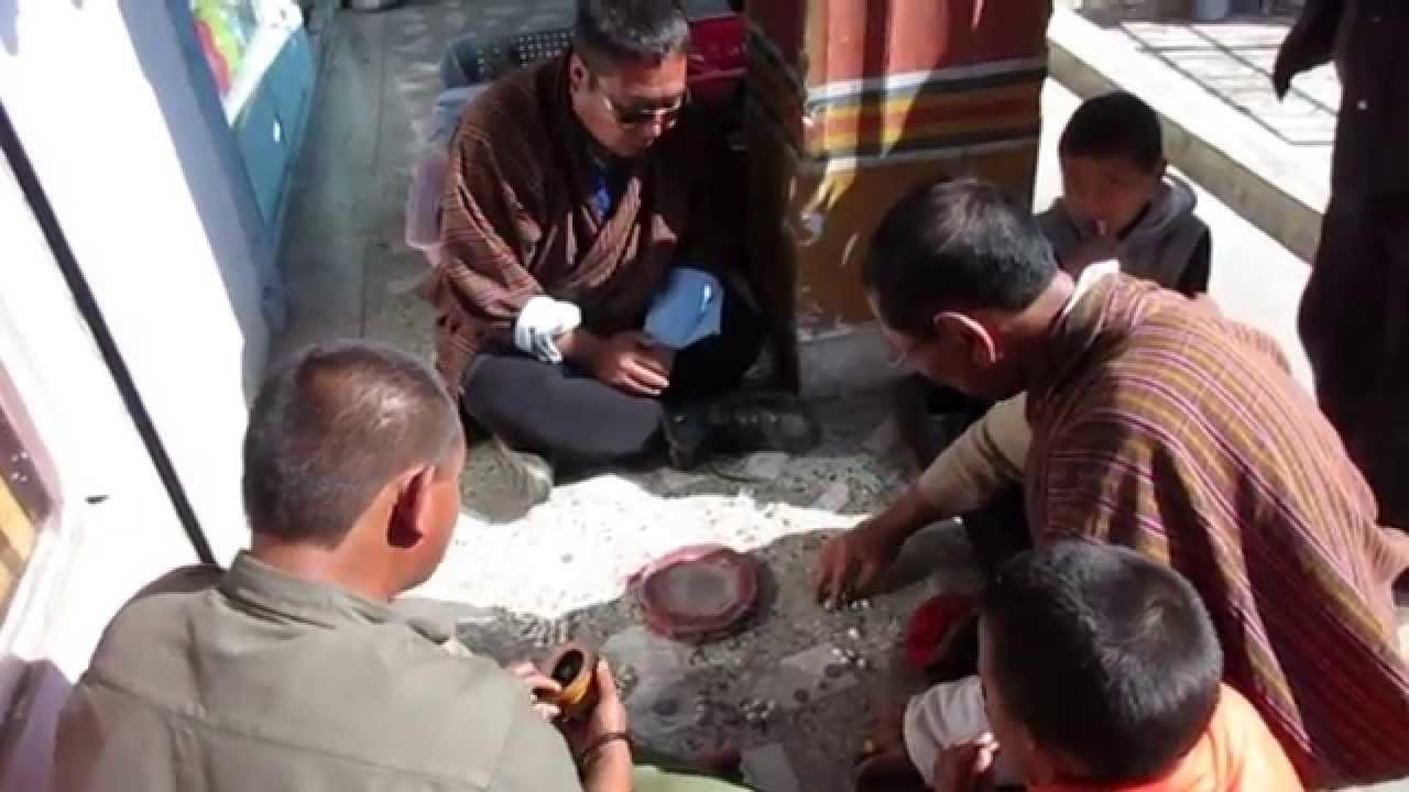 Tibetan dice game. Paro Bhutan - YouTube