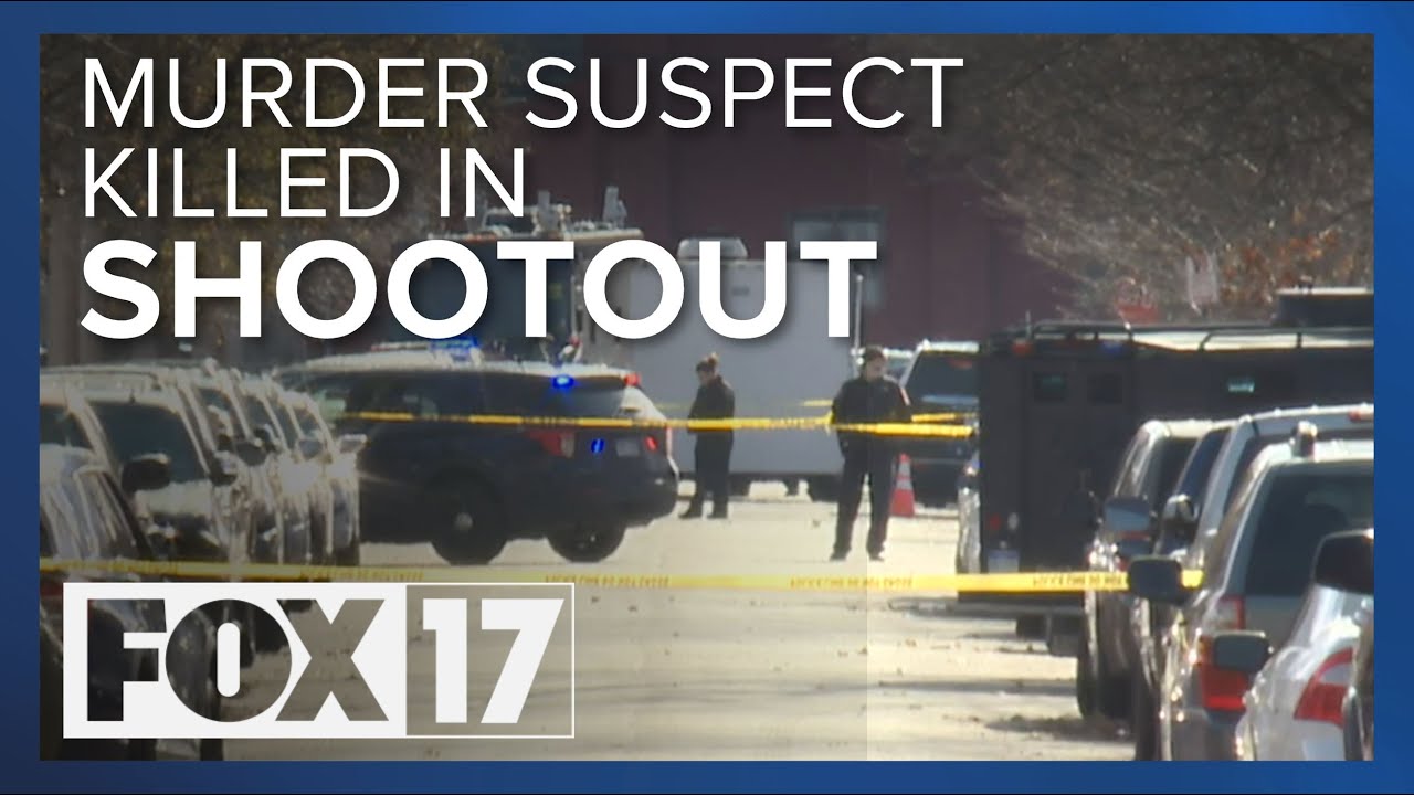 Murder suspect killed in 'running gun' shootout with police - YouTube