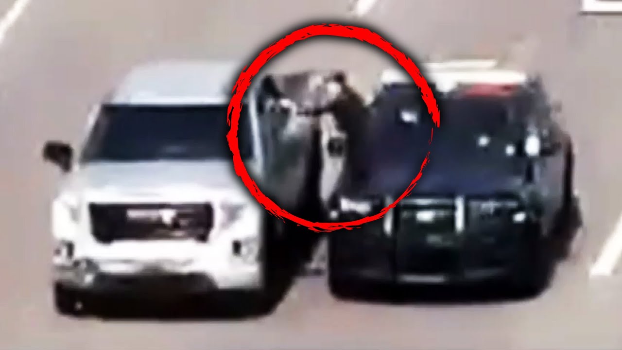 Cop Climbs Into Moving Car to Save Driver During Emergency - YouTube