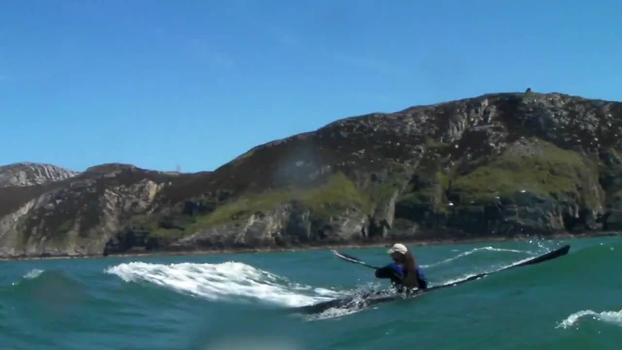 Gemma Rawlings surfing at the South Stack, Holyhead - YouTube