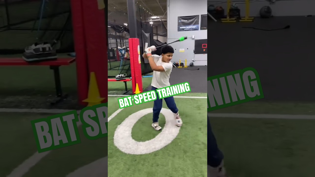 Trainer Jova Thomas and Aiden Alberto training bat speed with the VELO OverSpeed Training Bat ...