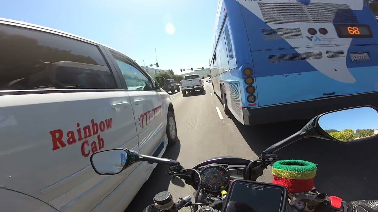 Car cuts off motorcycle - YouTube