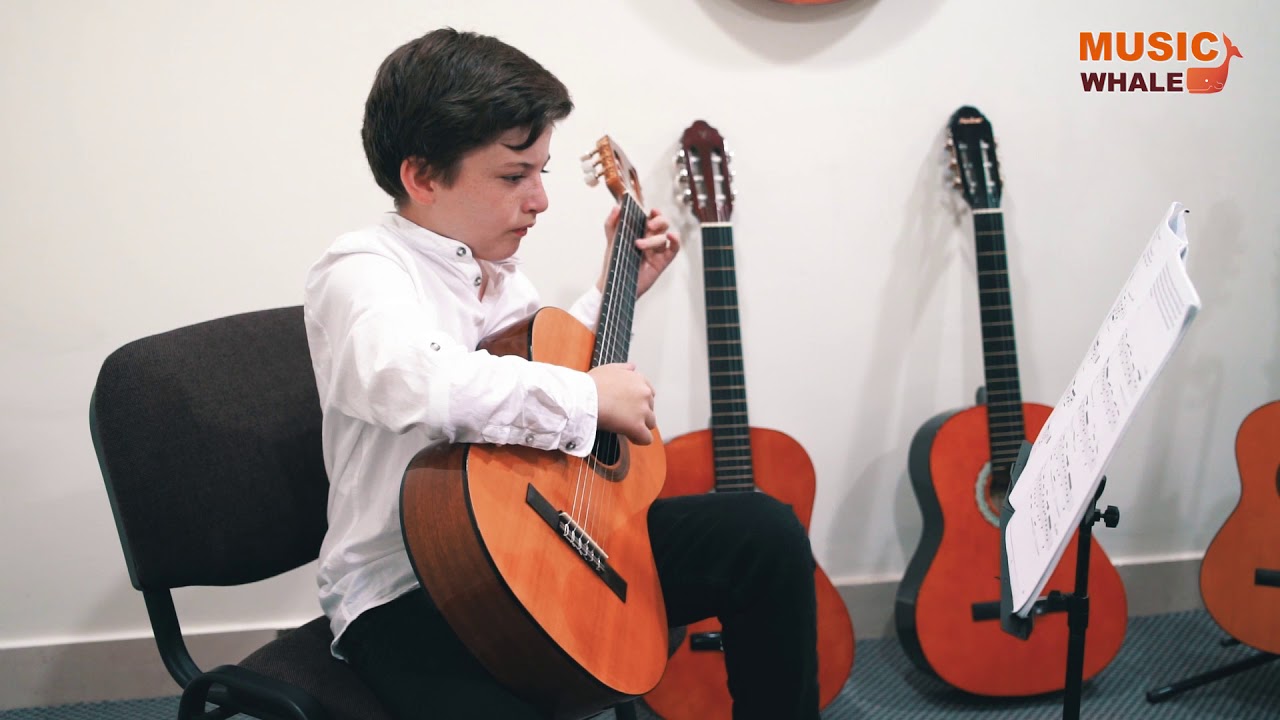 Ahmad Al Qasem Playing Guitar @ Music Whale - YouTube