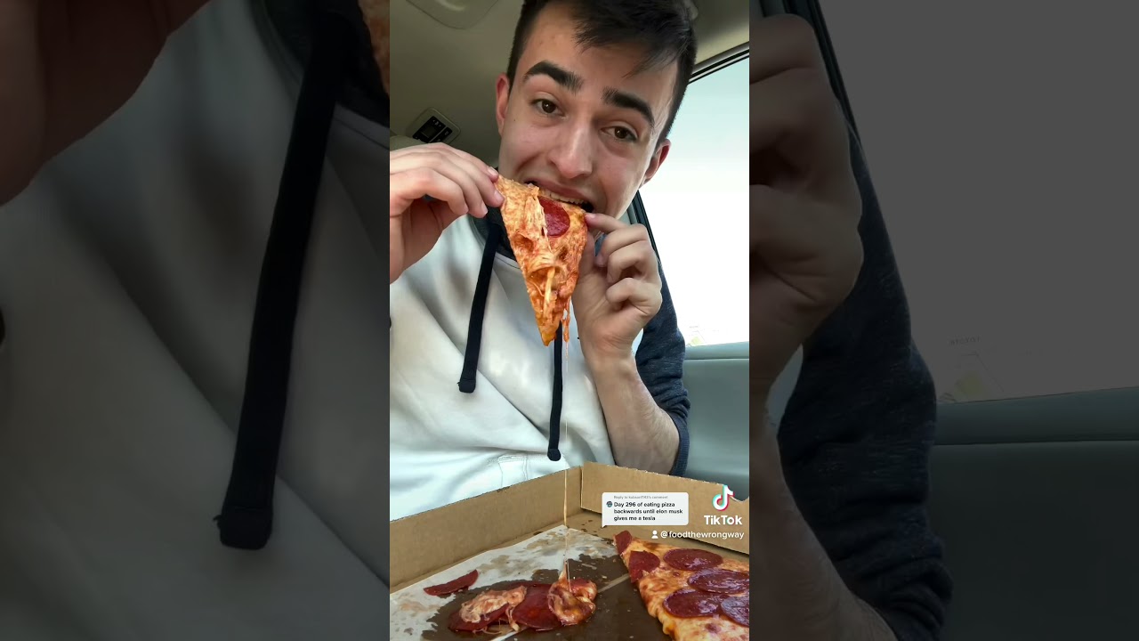Eating pizza backwards day 296 - YouTube