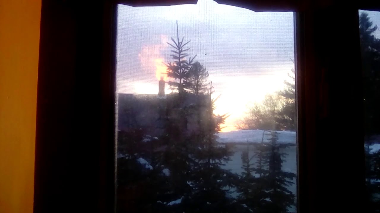Fire shooting out of my neighbor's chimney?!? - YouTube