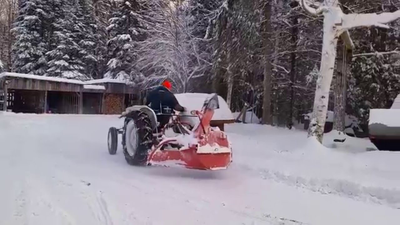 1953 Ford Jubliee Tractor using old pull-behind V-type snowblower (1 of ...
