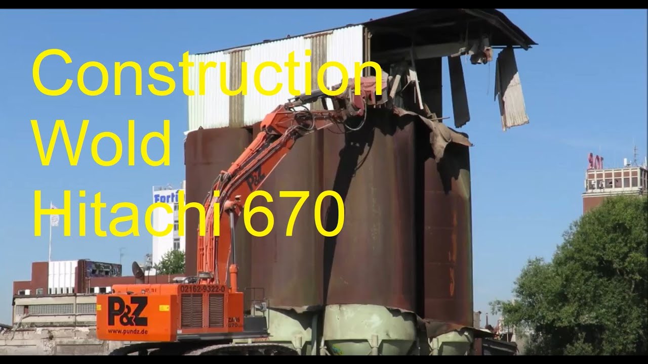 Excavator Hitachi 670 demolition old industrial plants - YouTube