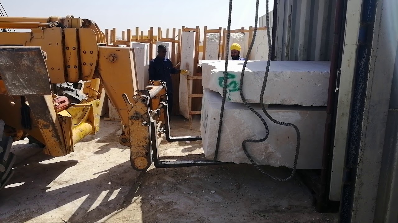 Marble block loading container. - YouTube