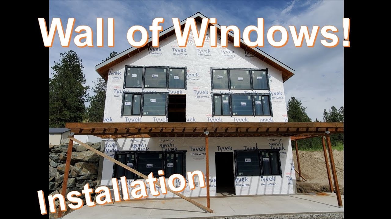 Installing the Wall of Windows | Building our Custom Home - YouTube