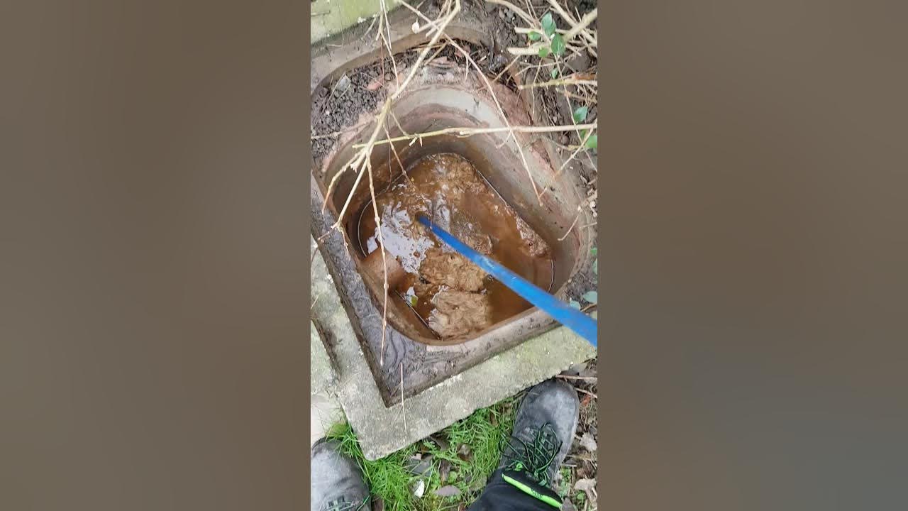 How to clear a blocked manhole - YouTube