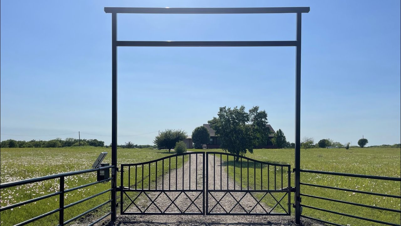 Custom pipe entry, custom automatic 14’ double swing gate with 14 ...