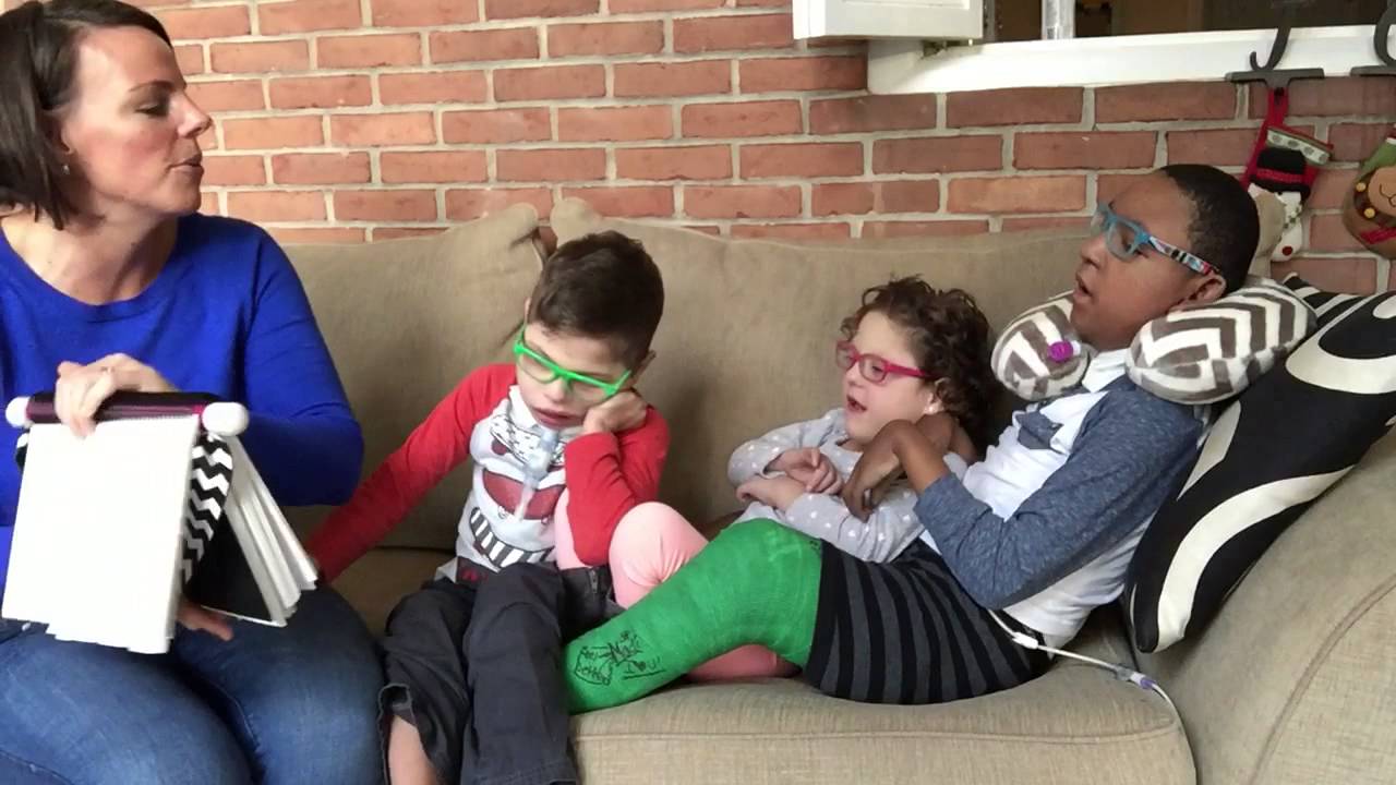 Three of our kids using PODD with direct access and partner assisted ...