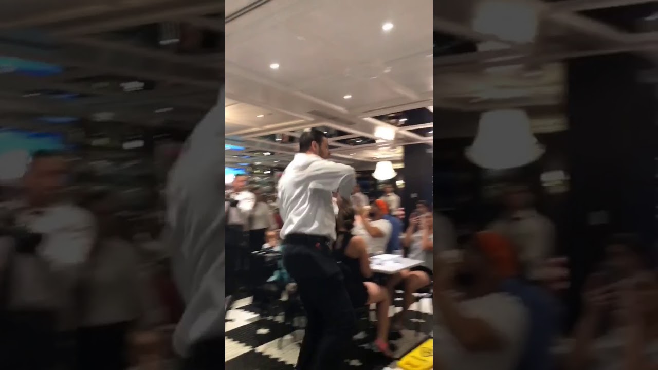 Servers at Sugar Factory dancing - YouTube