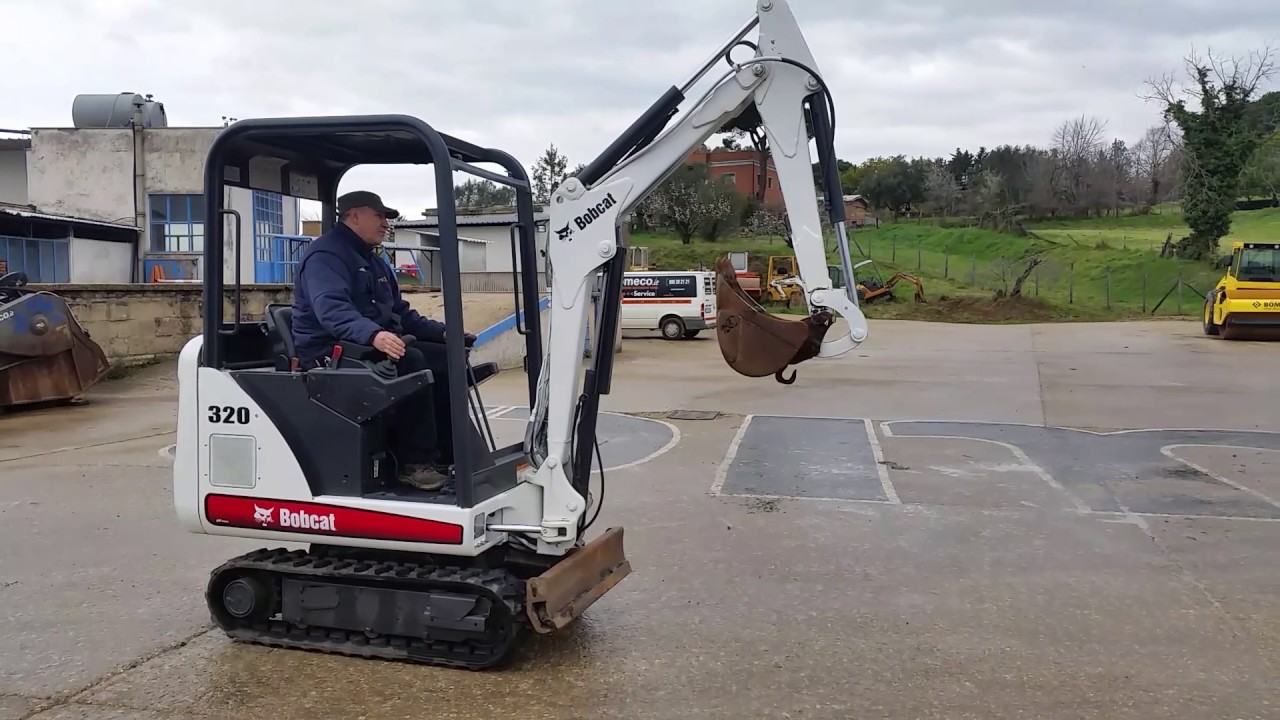 BOBCAT X320 - YouTube
