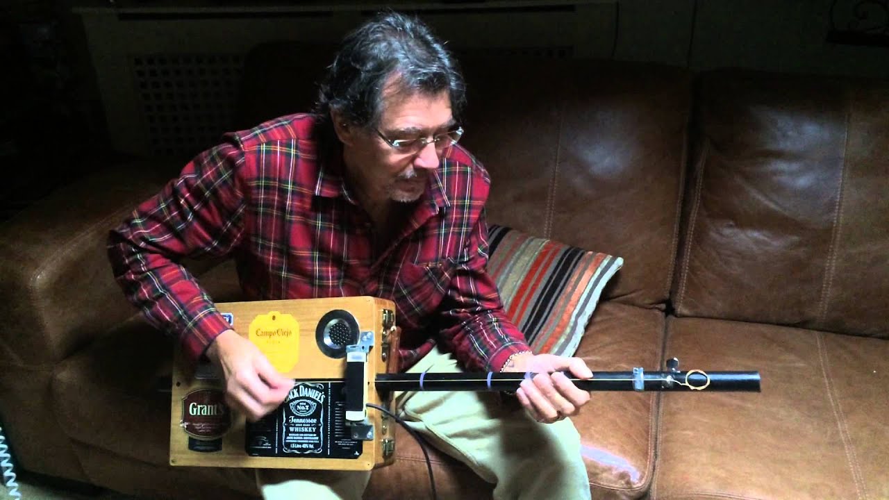 Stan playing his homemade one string diddley bow! - YouTube
