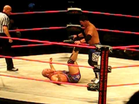 tna aj styles usues ric flairs figure four leg lock wembley arena 2010 ...