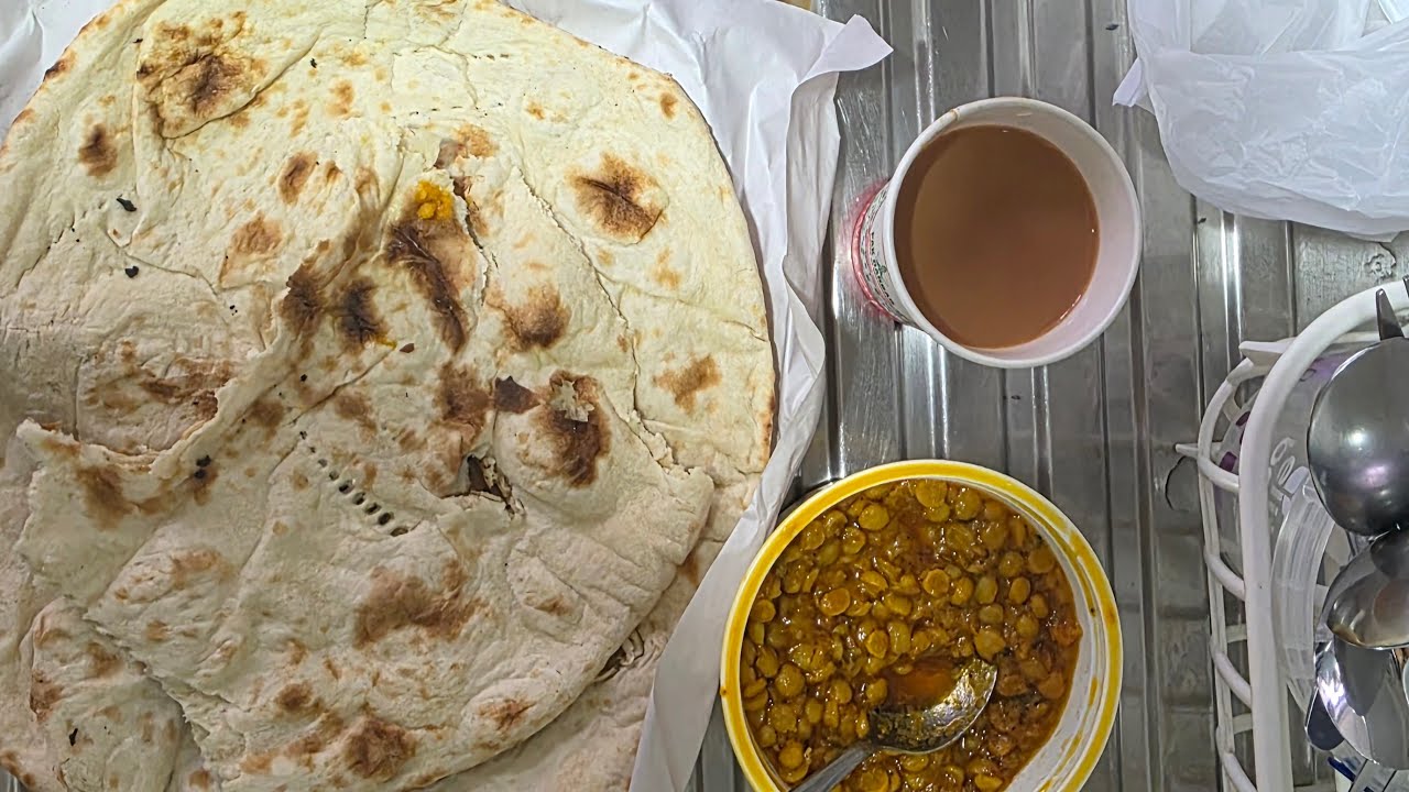 Yummy eating roti, Chana with karak tea, Dubai! - YouTube