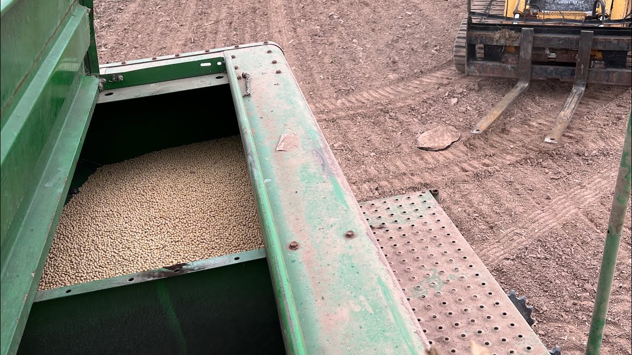 Planting soybeans before the rain - YouTube