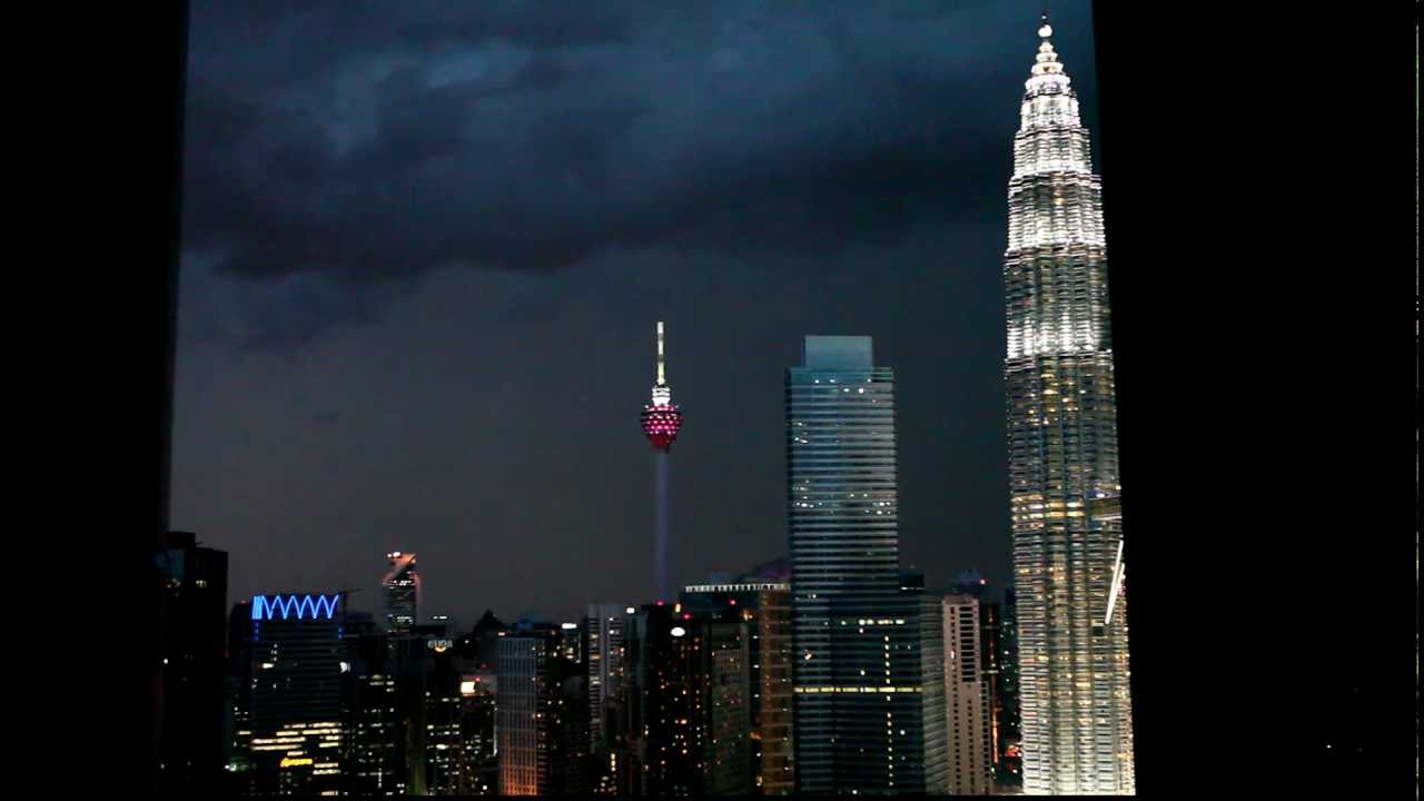 Thunderstorm in KLCC as seen from Troika - YouTube