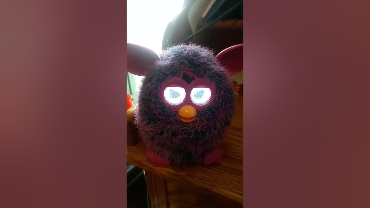 Maddie startled by Evil Furby - YouTube