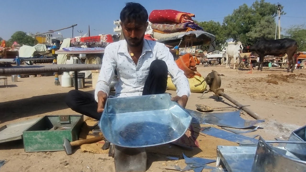 A poor man sitting on the roadside made a wonderful product for the ...