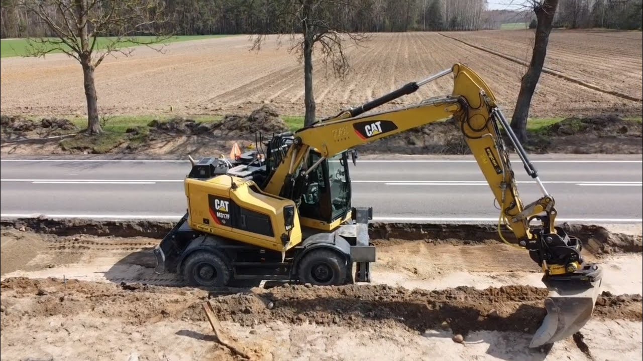 CAT M317F Tiltrotator Engcon DK 19 Lewoskręt 2. - YouTube