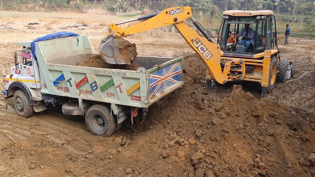 NEW JCB Backhoes Cutting Soil and Loading in Dump Truck - Truck ...