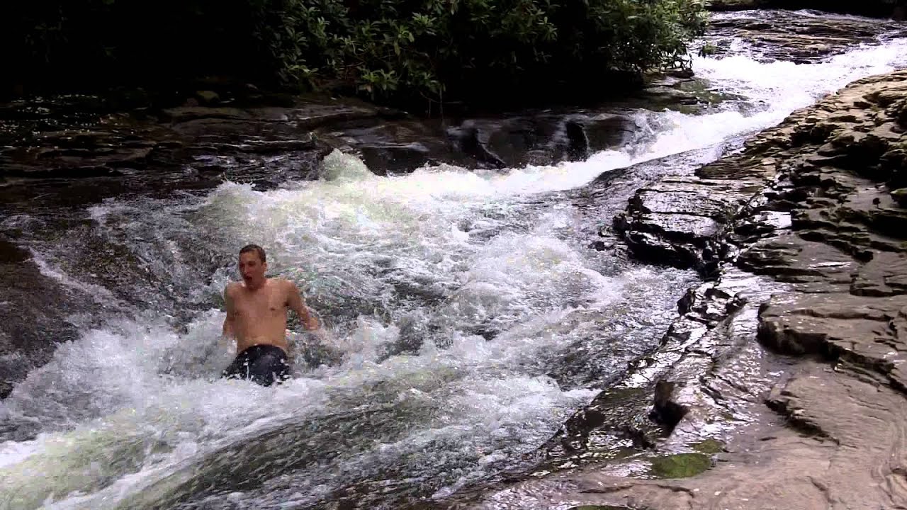 Eric slides down the natural water slide at Ohiopyle State Park - YouTube