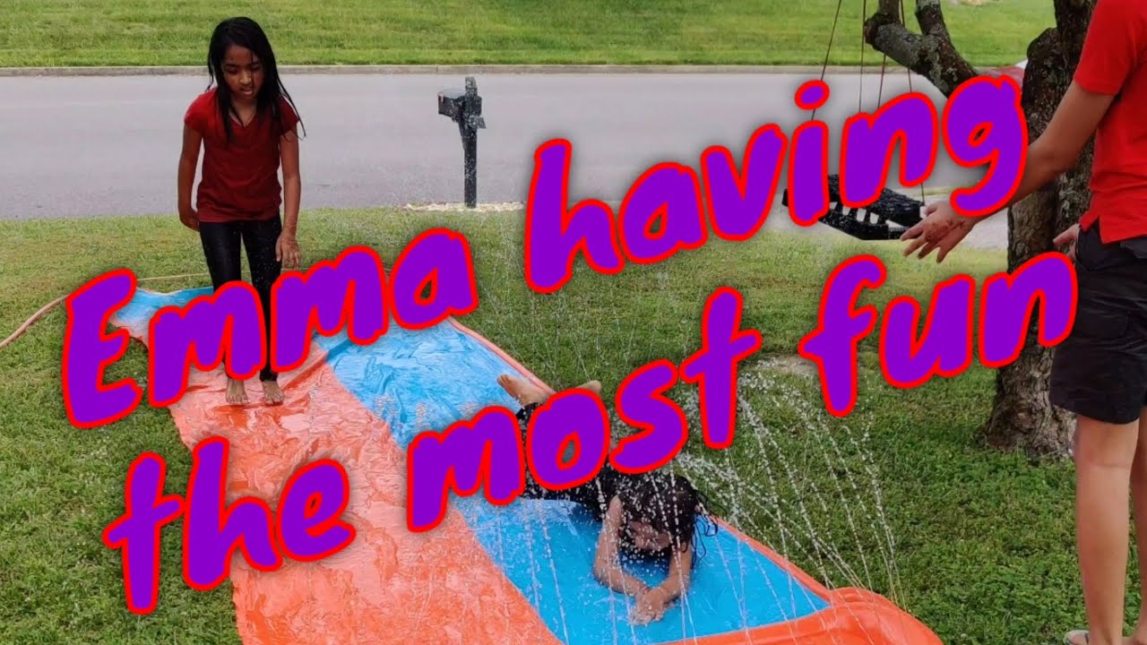 Emma having the most fun on water slide - YouTube