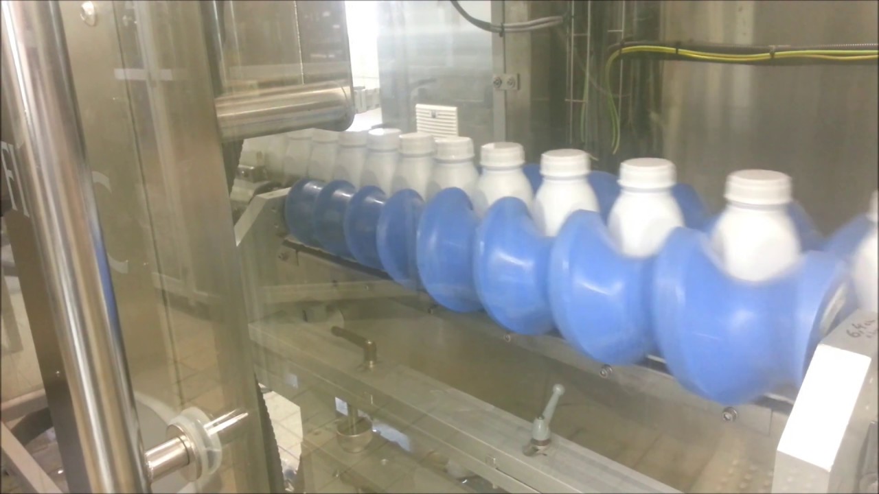 Finpac Shrink Sleever for Square Milk Bottle - YouTube