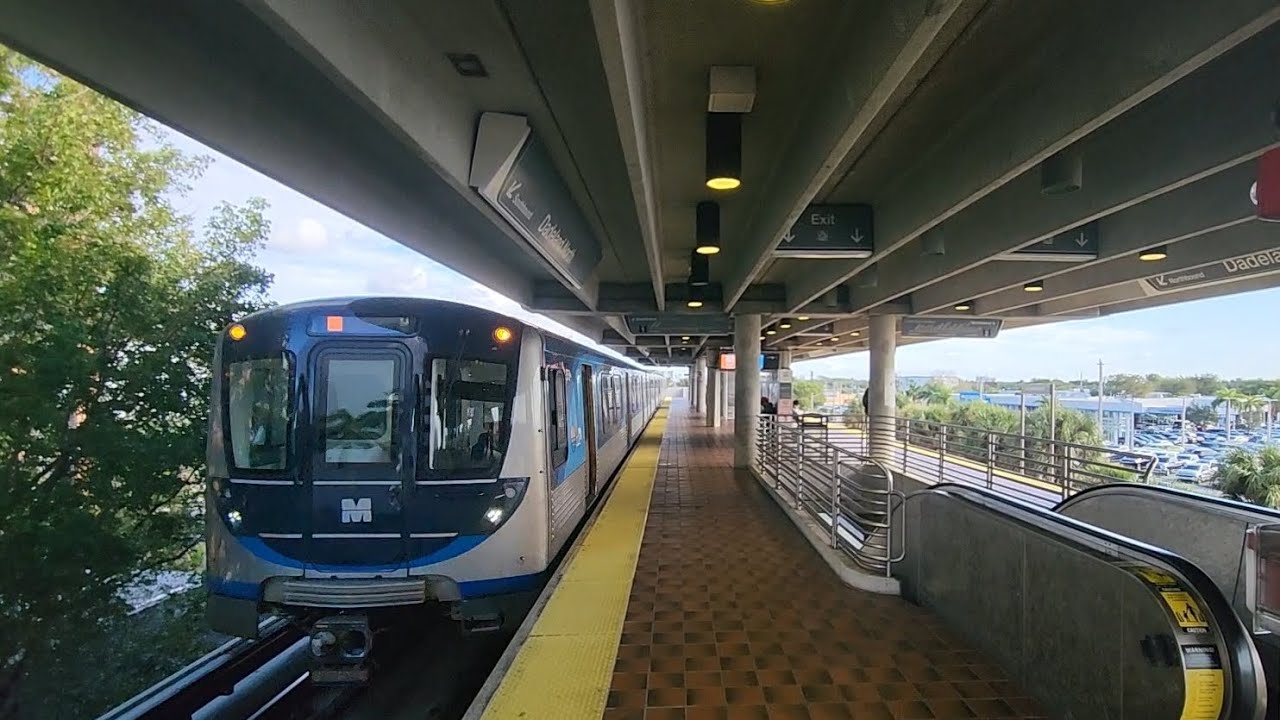 Miami Metrorail Southbound Orange Line train arriving and departing at ...