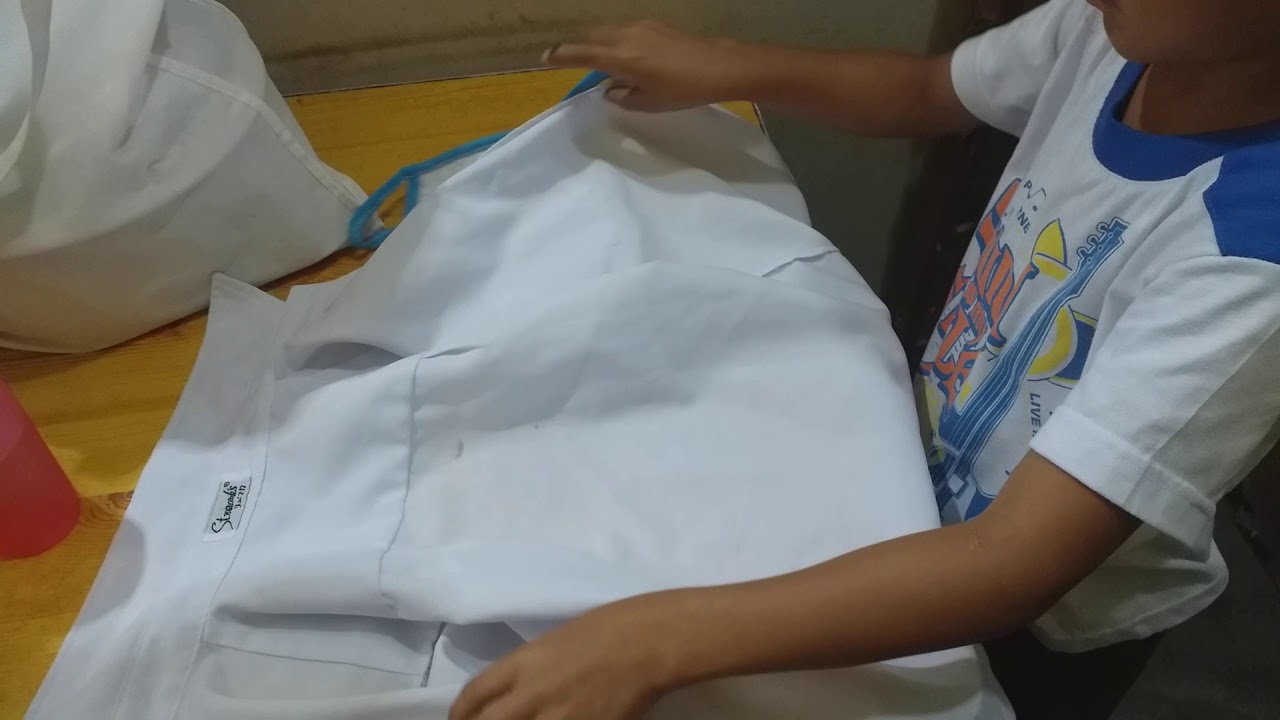 How to fold your uniform in just a minute - YouTube